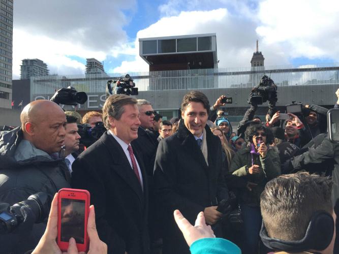 Cheering fans, angry cabbies greet Prime Minister Justin Trudeau