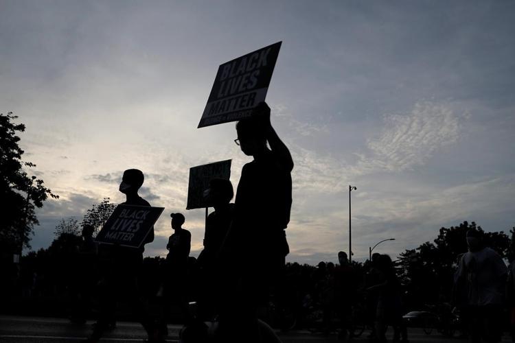Protesters return to St. Louis area where couple drew guns