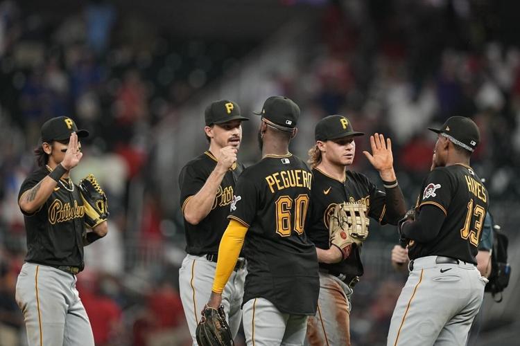 Reynolds hits 2-run homer as Pirates' 8-4 win delays Braves clinching ...