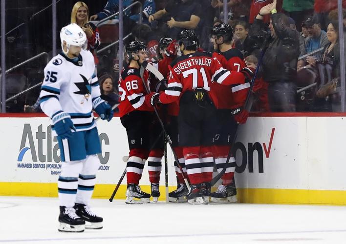 Devils win third straight, edge Sharks behind Blackwood