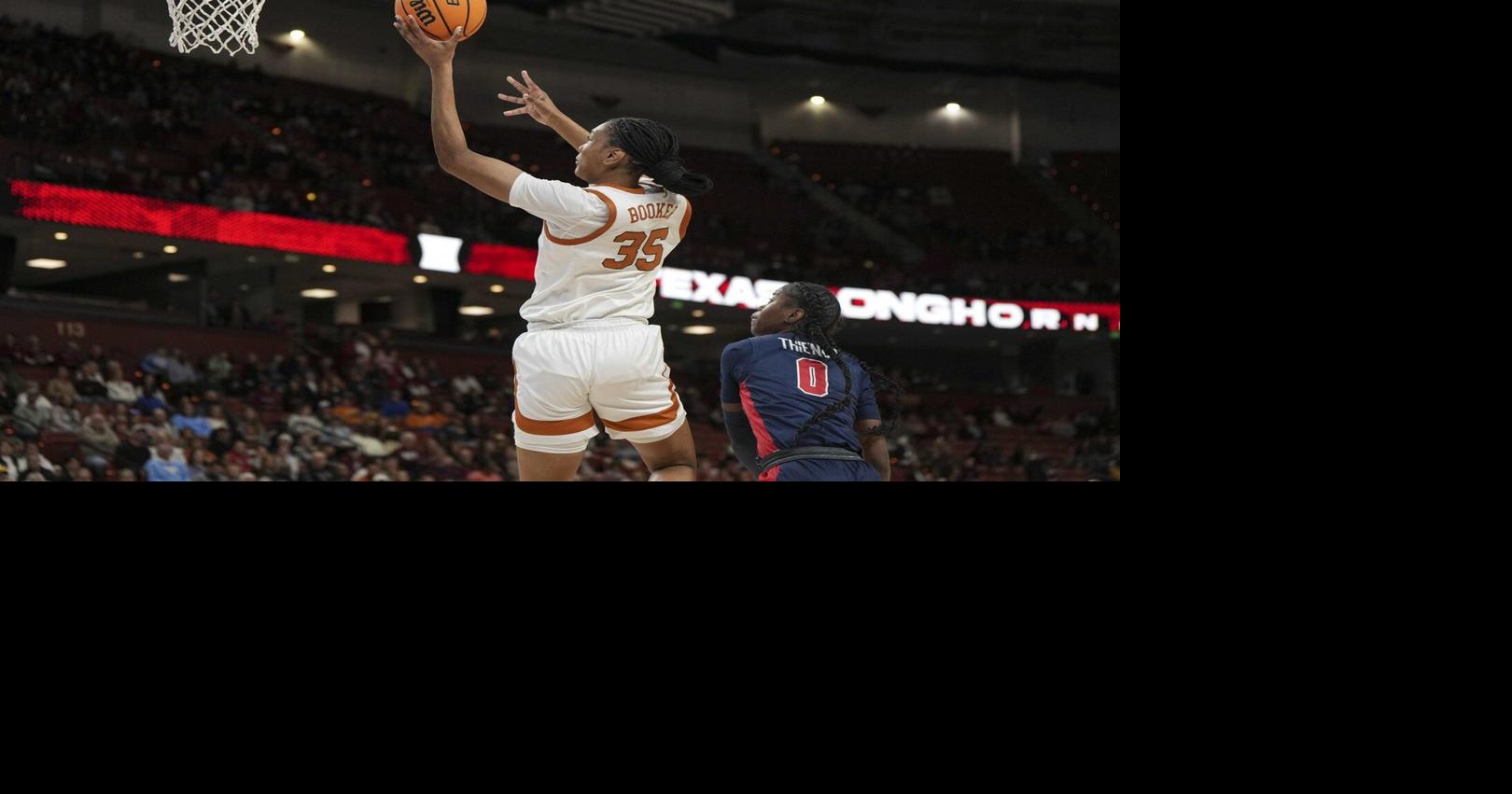 Madison Booker scores 19 as No. 1 Texas holds on to defeat Mississippi ...