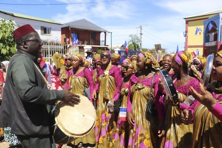 French President Macron brought new promises to cyclone-battered ...