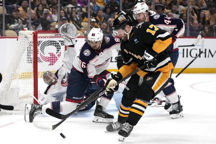 Malkin scores twice to reach 20 goals for the 15th time as Penguins ...