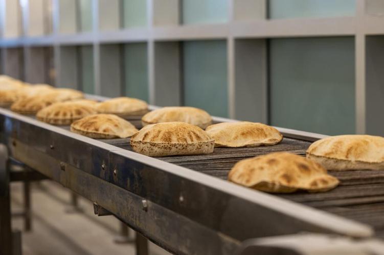 Marché Adonis’s beloved pita machine working again