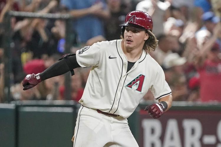 Merrill Kelly strong in return to mound, D-backs stay hot with 12-5 win ...