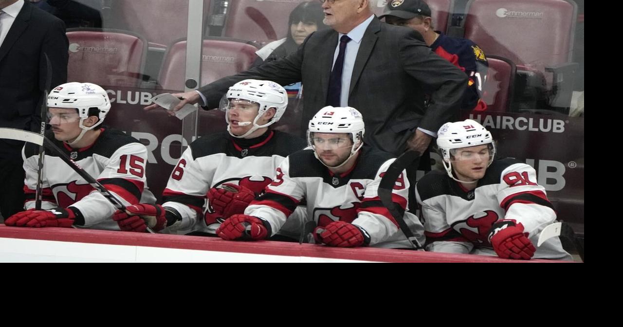 Devils coach Lindy Ruff struck in face by puck, misses 3rd period of 3 ...