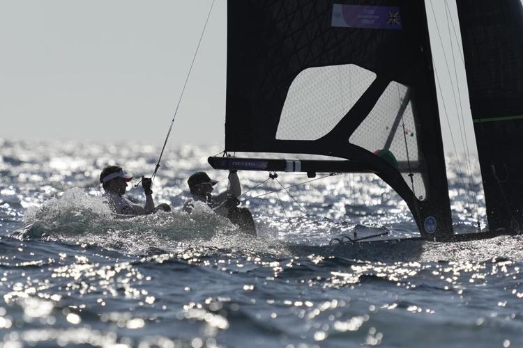 A lack of wind forces scuttles first Olympic sailing medal races ...