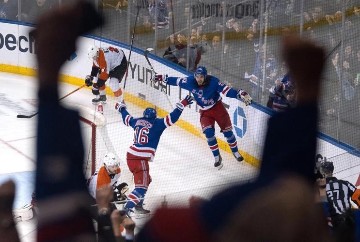 Rangers become 1st NHL team to clinch playoff berth, beat Flyers 6-5 on Fox's quick goal in OT