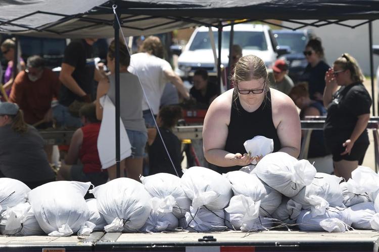 Midwestern Flooding Collapses A Bridge Forces Evacuations And Kills At