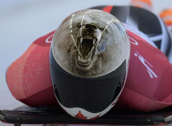 Olympic skeleton competitors show personality in their helmets