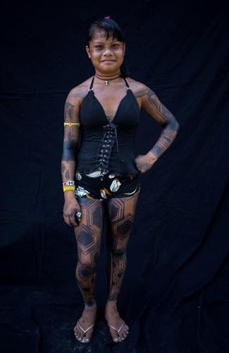 AP PHOTOS: Amazon’s Tembe paint bodies for rituals and war
