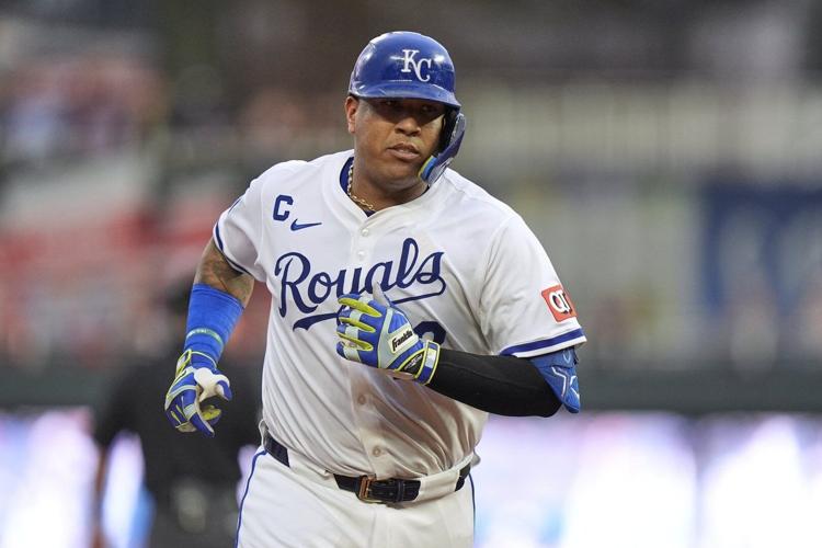 Royals score four in the eighth to snap Seattle's 10-game winning streak