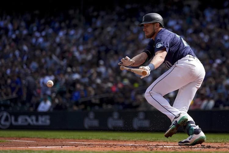 Logan Gilbert reaches 200 Ks, Mariners stay on edge of playoff race ...