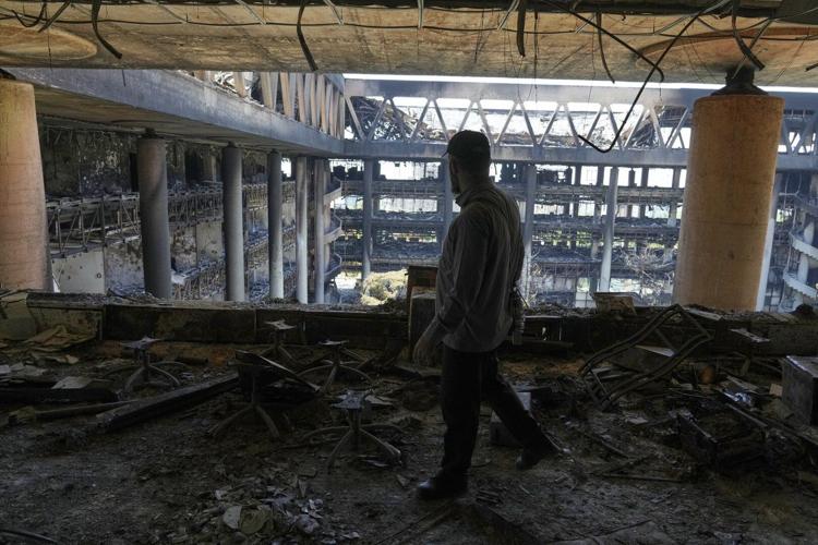Photos of the aftermath of an Israeli strike on the headquarters of ...