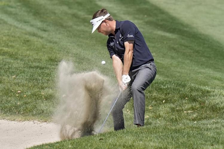 Streelman puts his new gadget to use on the greens. He leads at ...
