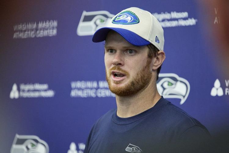 Seahawks QB Sam Darnold is learning a new city and offense with plenty ...