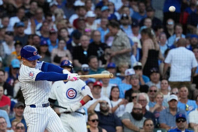 Dansby Swanson hits 2 of Chicago's 5 HRs as the Cubs beat the Padres 9-7