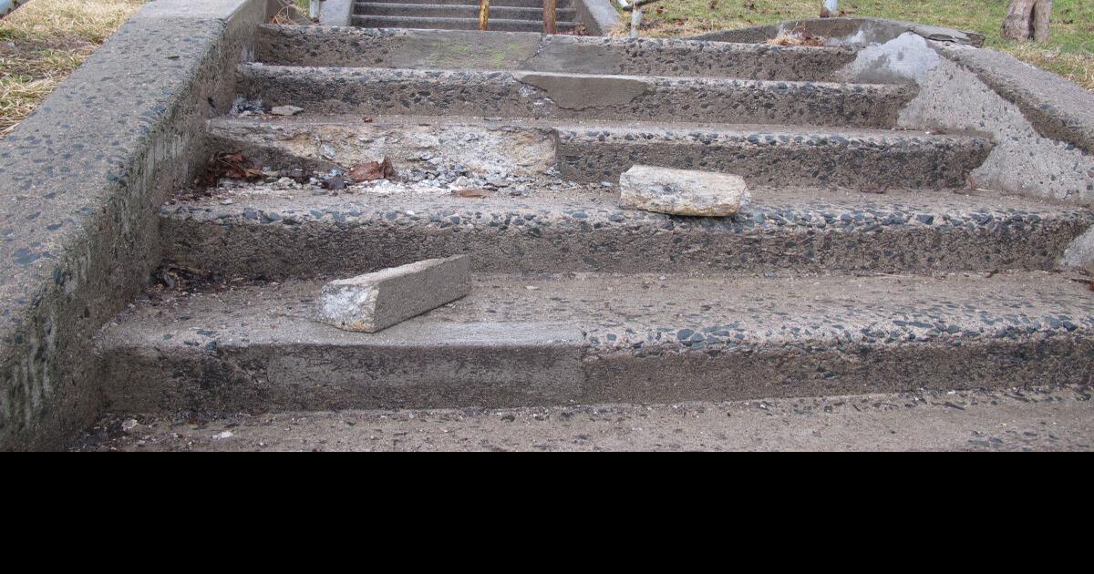 Step carefully on crumbling stairs that run down Davenport Rd. hill ...