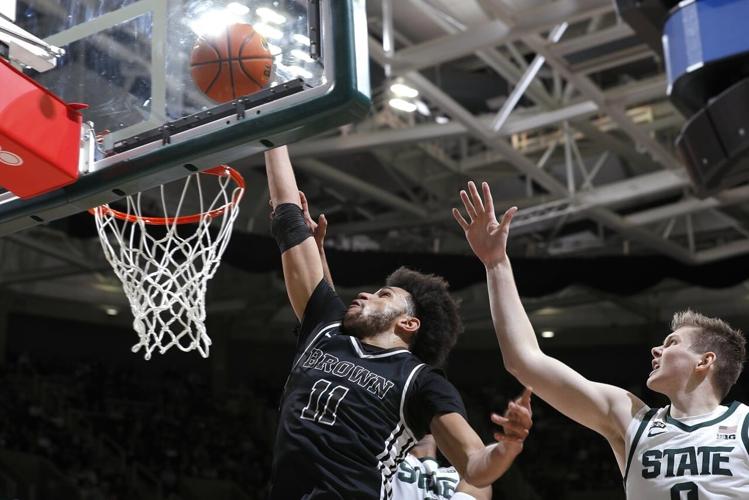 Hauser scores 22 points in Michigan State’s easy victory