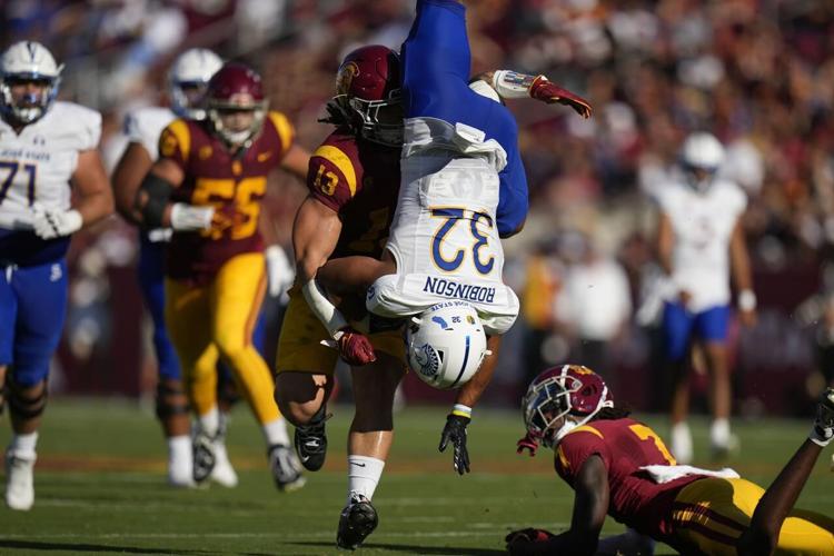Heisman winner Caleb Williams throws 4 TD passes, leads No. 6 USC past ...