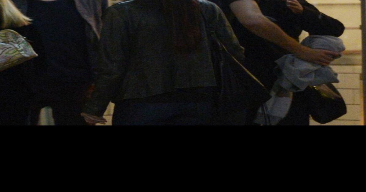 Robert Pattinson kisses mystery woman goodnight in Toronto