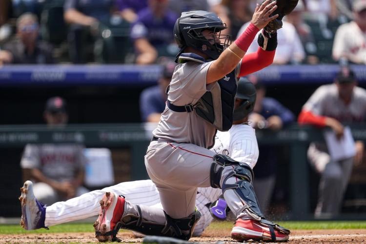 Doyle hits 1st career grand slam, Rockies tie franchise record for runs ...