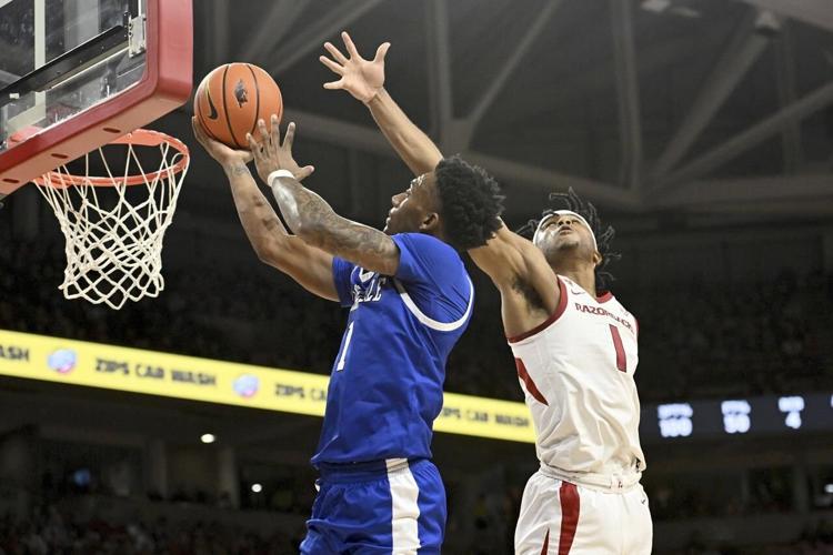 Graham, No. 10 Arkansas breeze past UNC Asheville 85-51
