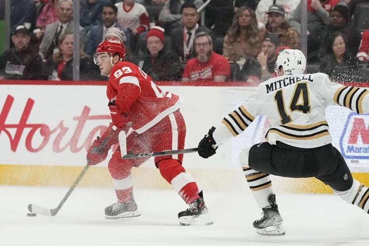 Larkin, Perron, Copp score in 3rd period as Red Wings win 5-4 to hand Bruins 1st regulation loss