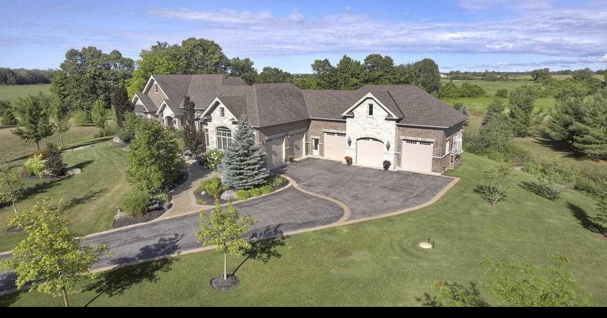 With lots of land and a pond, this custom bungalow in Port Perry is ...