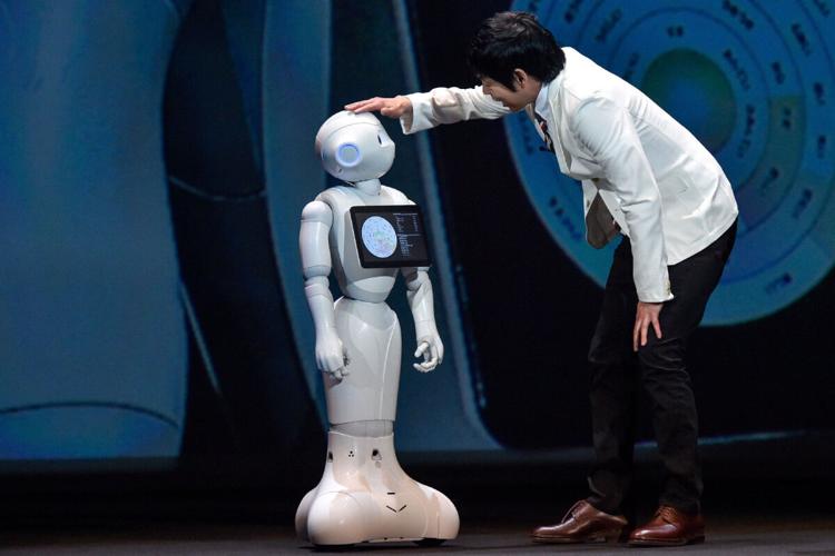 Child-like robot with ‘heart’ goes on sale in Japan