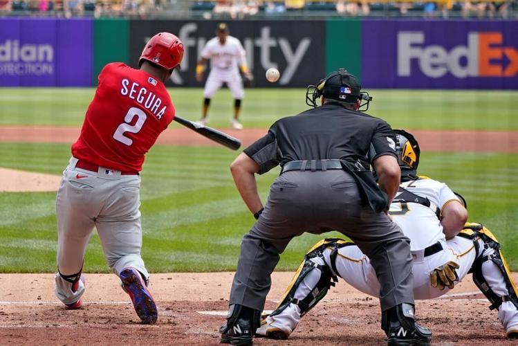 Gibson excels in Phils debut; Realmuto, Harper pound Pirates