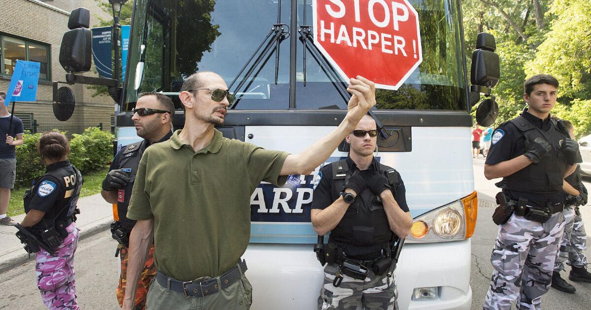 Harper opens election campaign in Montreal, met by protesters
