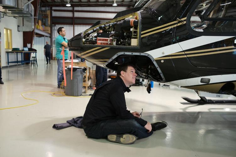 Take off, eh? Helicopter father-son team begins global odyssey