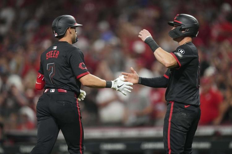 Spencer Steer hits 2 of the Reds' 5 homers in a 7-4 win over the Cubs