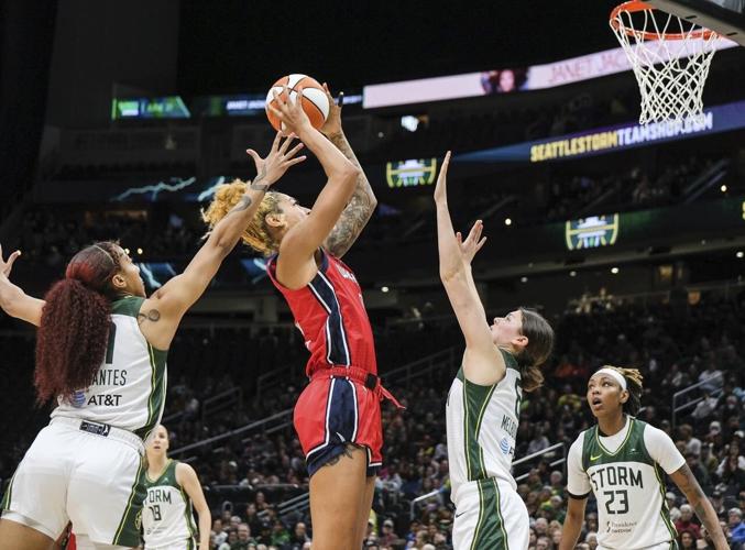 Sykes, Austin lead Mystics to 73-66 victory over Storm