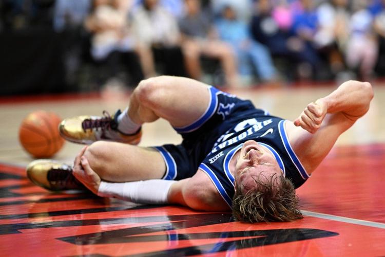 Davis scores 18, No. 9 BYU uses second-half surge to beat Miami 72-62