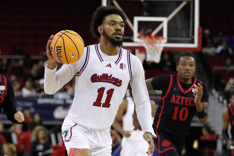 NCAA investigates 13 former basketball players for sports betting ...