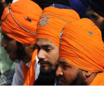 why do sikh have beards