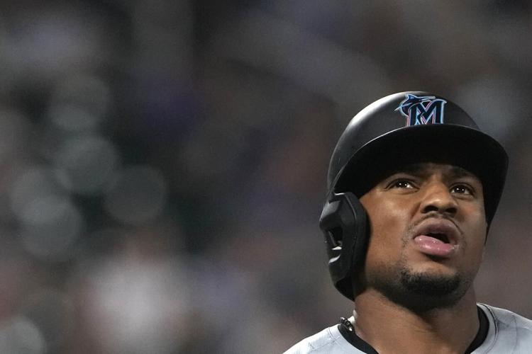 Marlins shortstop Xavier Edwards leaves game vs. Cubs due to back ...