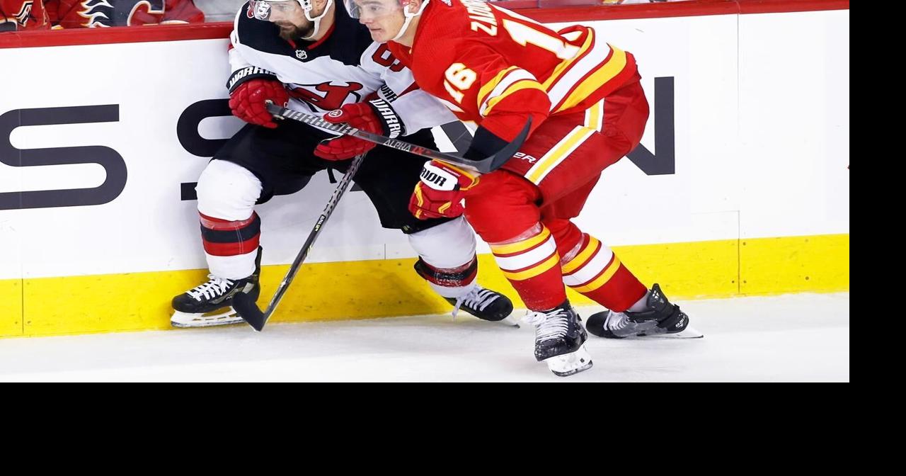 Red-hot Devils work overtime to burn Flames 4-3