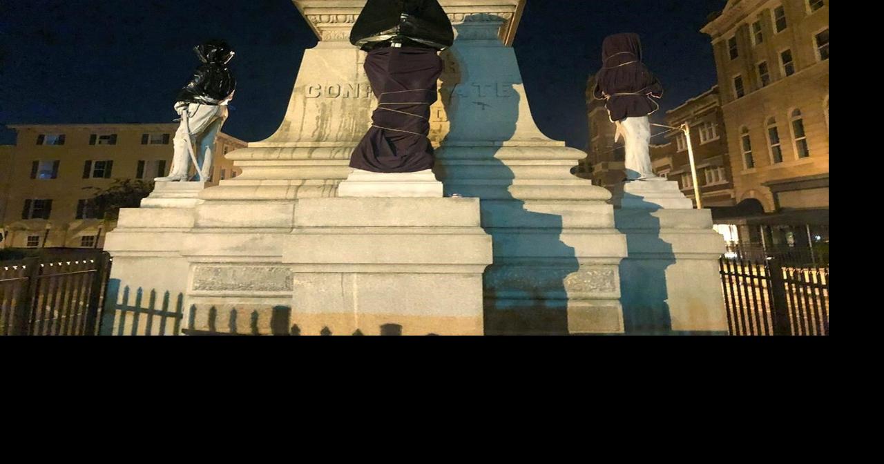 Confederate monument in Virginia covered with trash bags