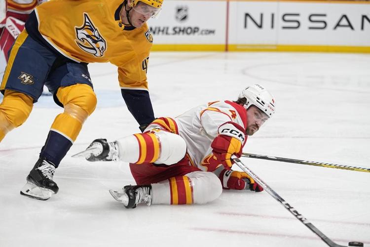 Flames score 4 goals in 1st, beat Predators 6-3 for 3rd straight win