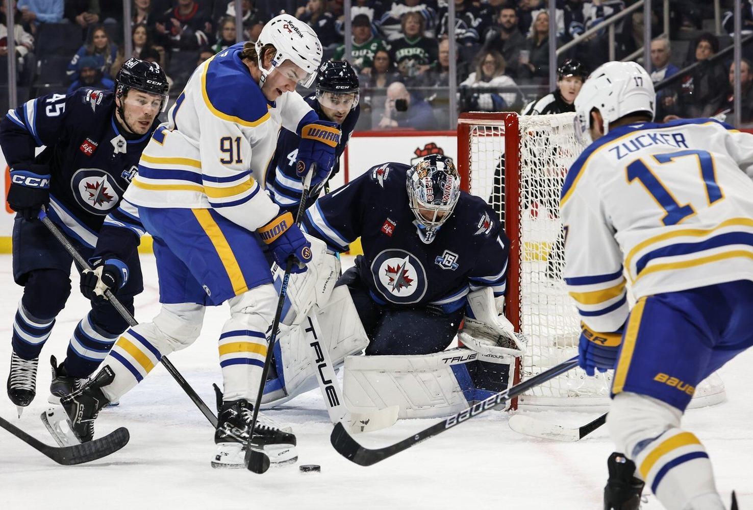 Eric Comrie makes 34 saves, Winnipeg Jets top Buffalo Sabres 4-1