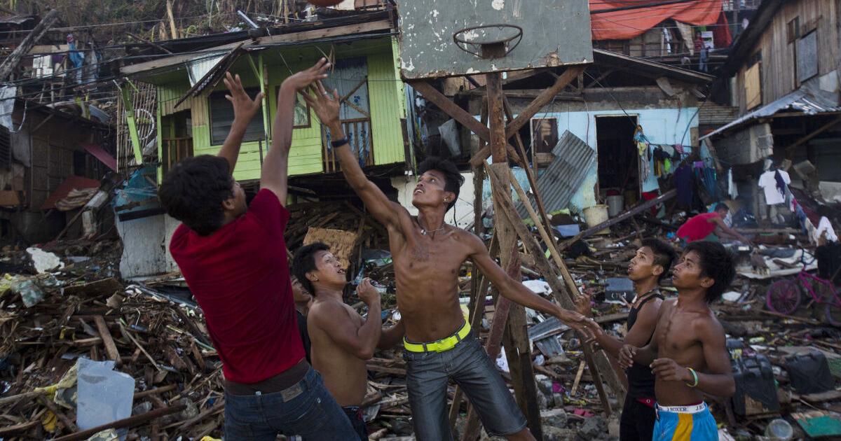 Philippines typhoon: signs of hope amid the misery