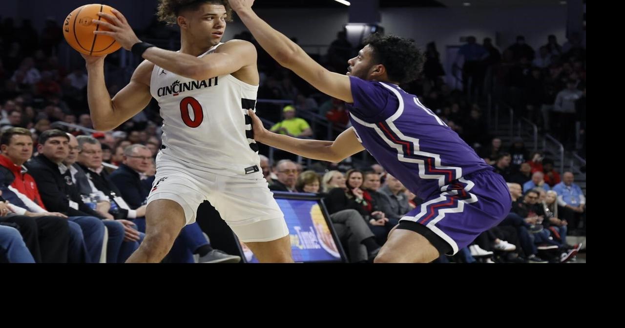 Thomas scores 21, Cincinnati upsets No. 19 TCU 81-77 in OT