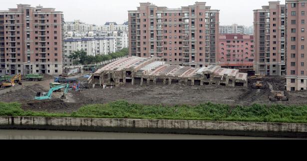 Three held in Shanghai building collapse