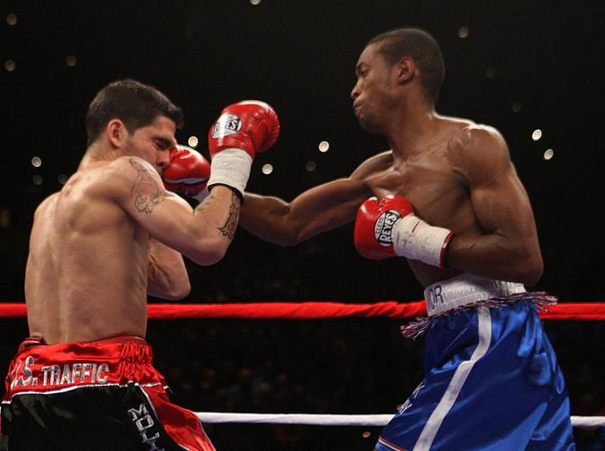 Molitor lands on his feet after fight of a lifetime