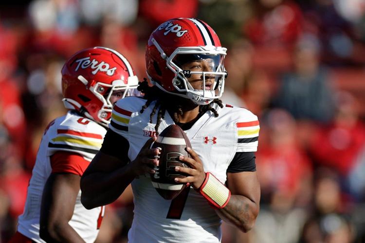 Freshman QBs Underwood and Washington meet when No. 18 Michigan faces ...