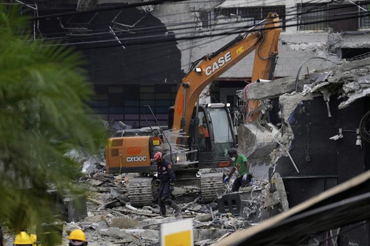 53 frantic hours of searching for survivors after the roof collapses at ...