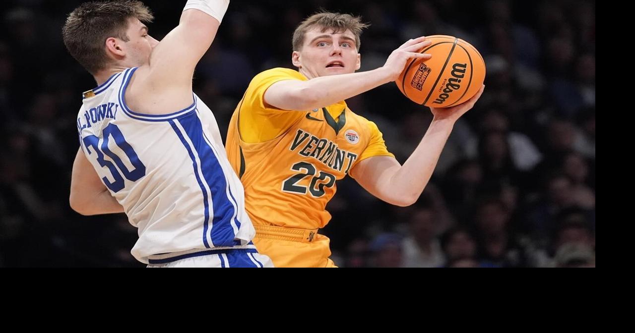 Vermont leading scorer TJ Long helped off court after injuring right ...